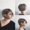 Undone Voluminous Silver Bob with Clean Lines and Side Swept Bangs ...